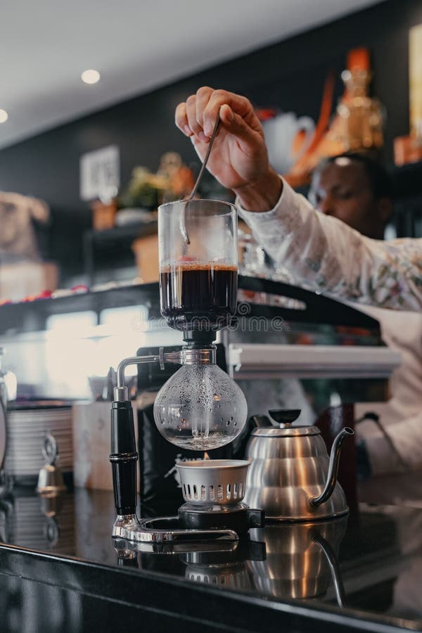 Making Coffee Using Siphon Stirring Stock Photos - Free & Royalty-Free Stock Photos from Dreamstime