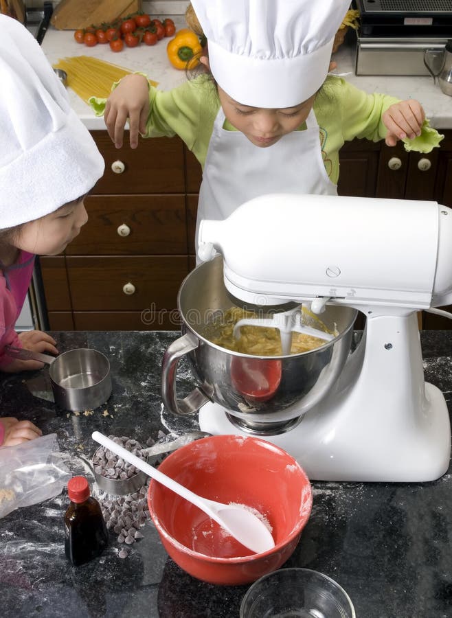 Making Cookies 003 stock image. Image of family, childhood - 2180411