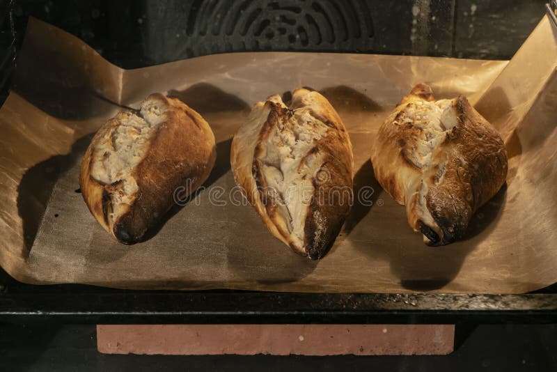 Making Craft Yeast-free Bread in a Home Oven, on the Baking Stone Stock ...
