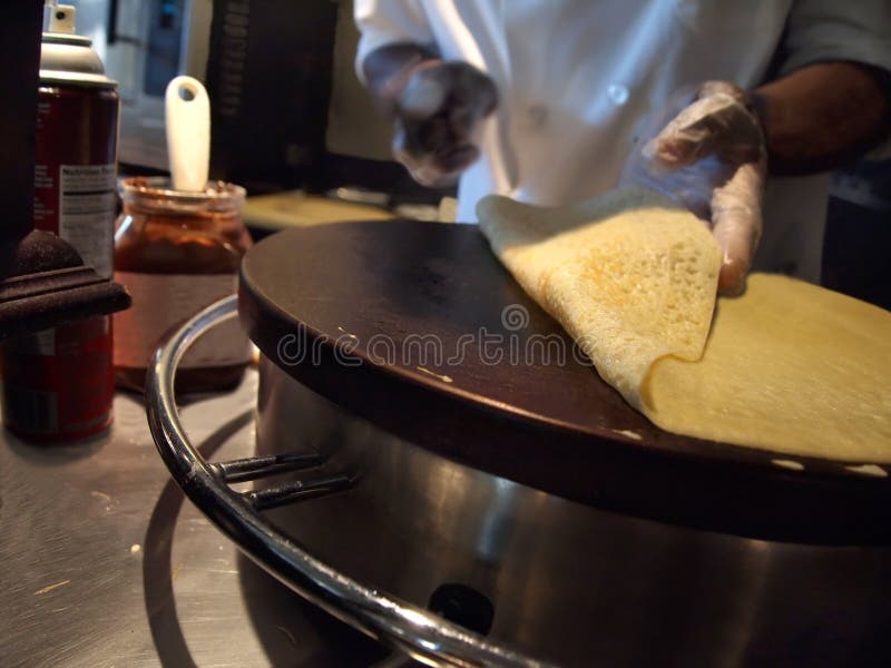 Making Crepes stock photo. Image of hands, galette, breton - 38450486