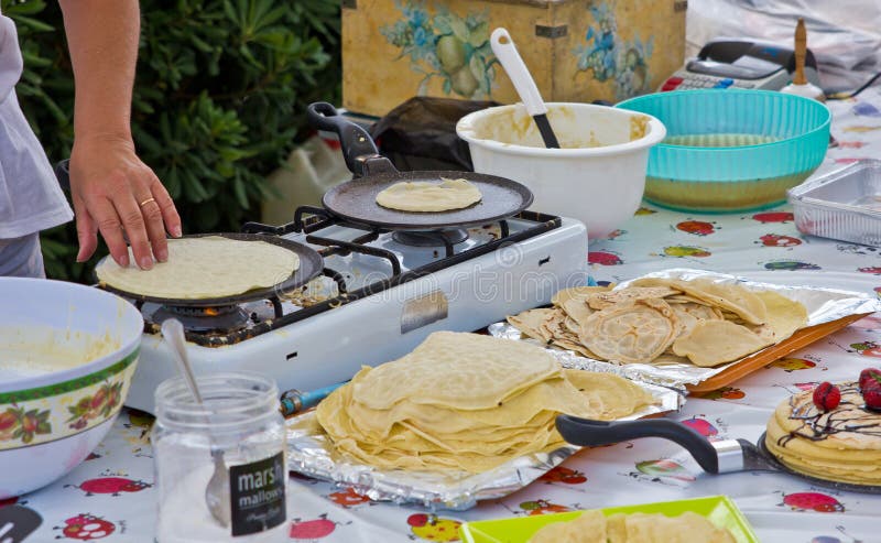 Making crepes stock image. Image of ingredients, crepes - 107330515