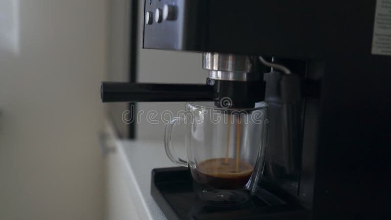 Automatic Coffee Machine with Coffee Pouring Espresso Drink. Making a ...