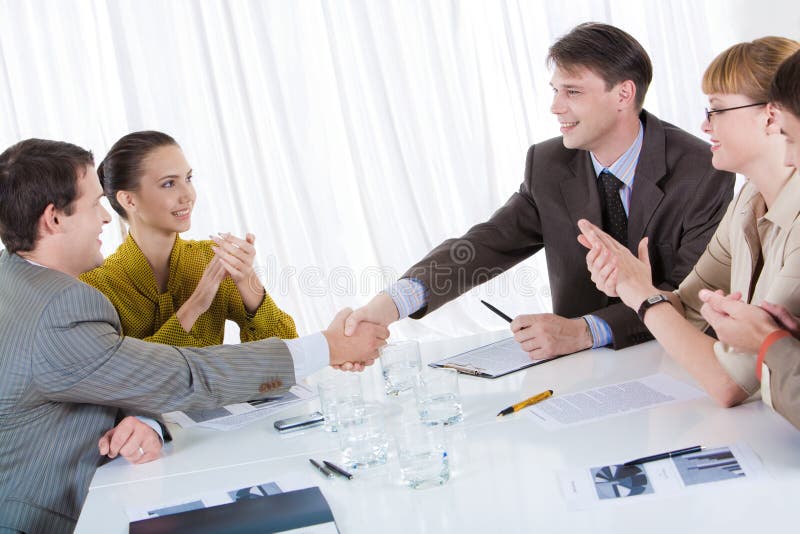 Happy Business People Closing a Deal Stock Image - Image of deal ...