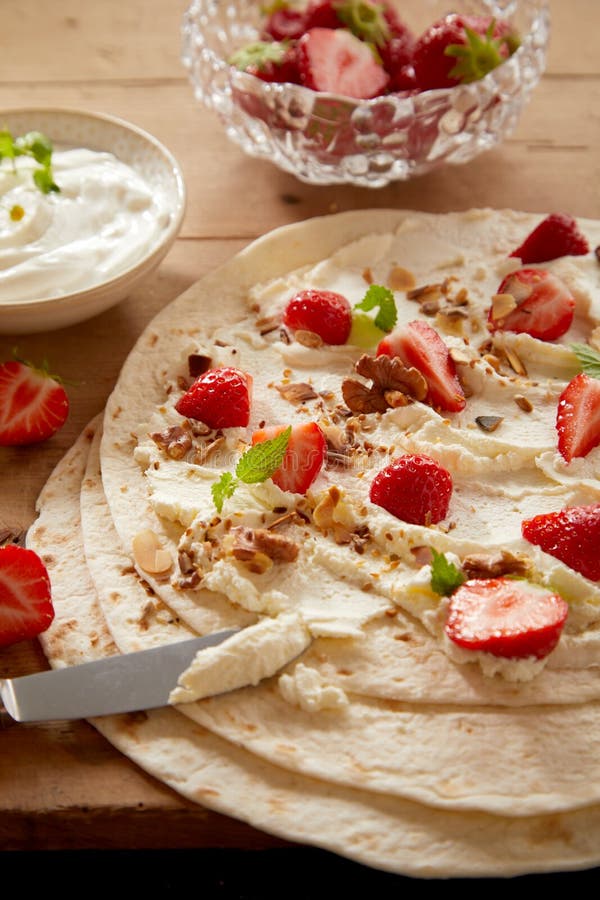 Making Delicious Strawberry and Cream Wraps Stock Photo - Image of ...
