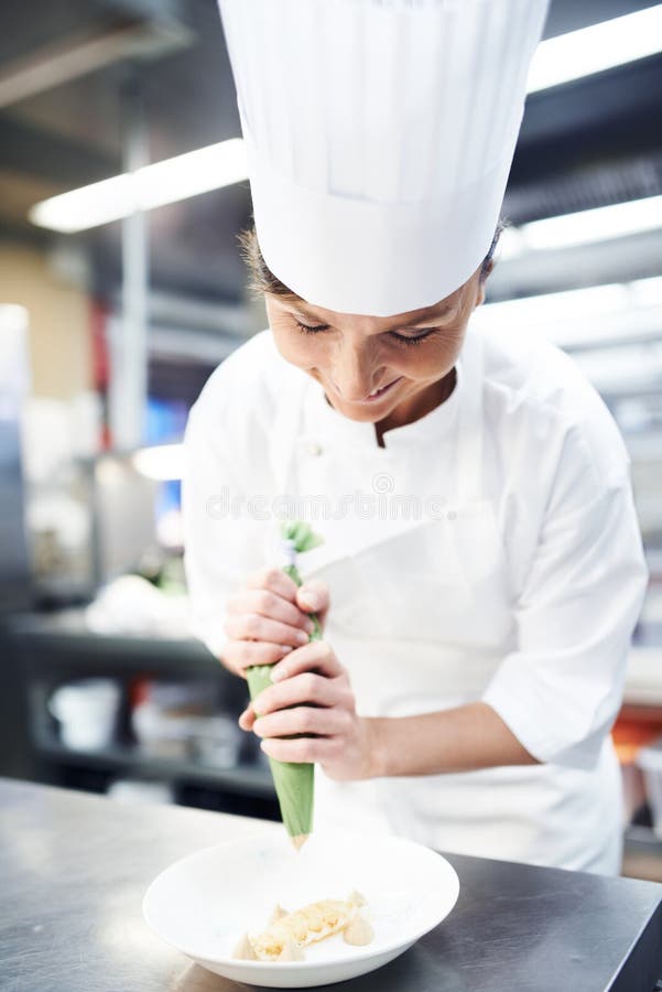 Making Desert a Work of Art. a Chef Preparing Dessert in a Professional ...
