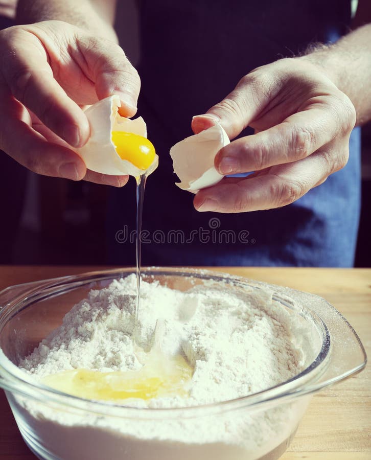 Making the Dough Adding Eggs To the Flour.Cooking Process Stock Image ...
