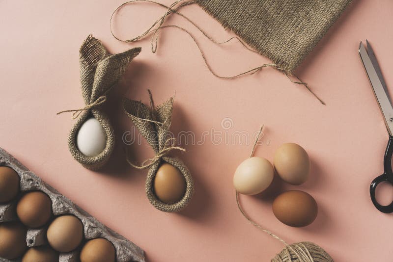 Making Easter Bunny from Eggs and Fabric on Pink Background Stock Image ...