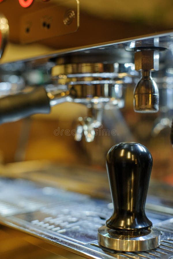 Making espresso coffee stock image. Image of coffeemaker - 91335463