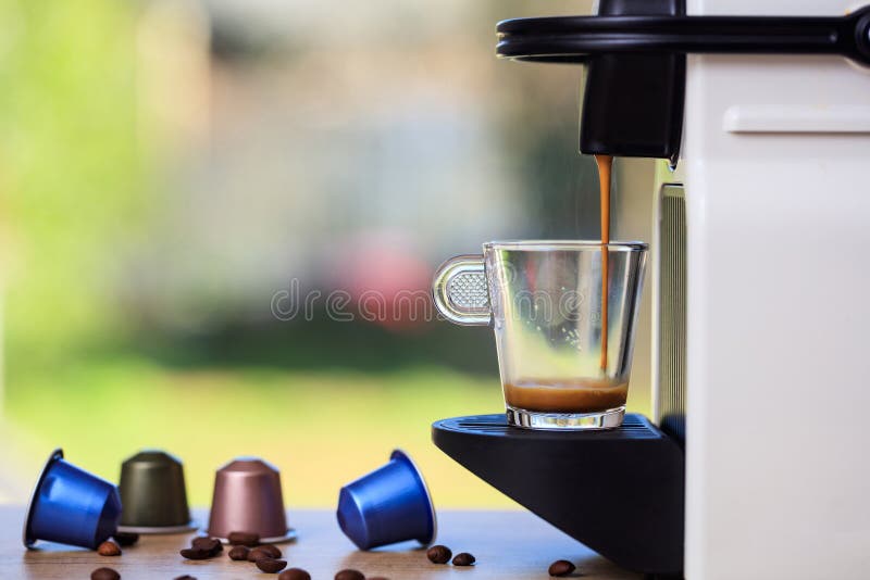 Espresso Coffee Machine on a Wooden Table, Blur Background, Space for ...