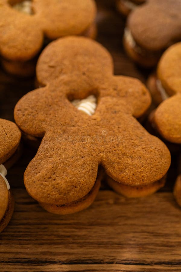 Making Festive Gingerbread Sandwiches on Rustic Wooden Table Stock ...