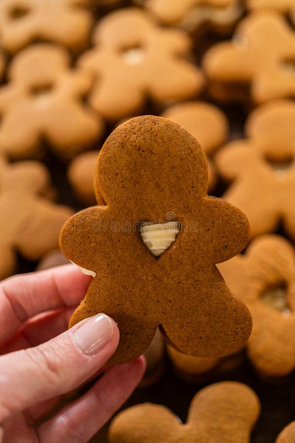 Making Festive Gingerbread Sandwiches on Rustic Wooden Table Stock ...