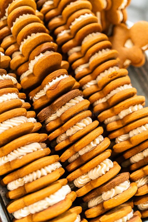 Making Festive Gingerbread Sandwiches on Rustic Wooden Table Stock ...