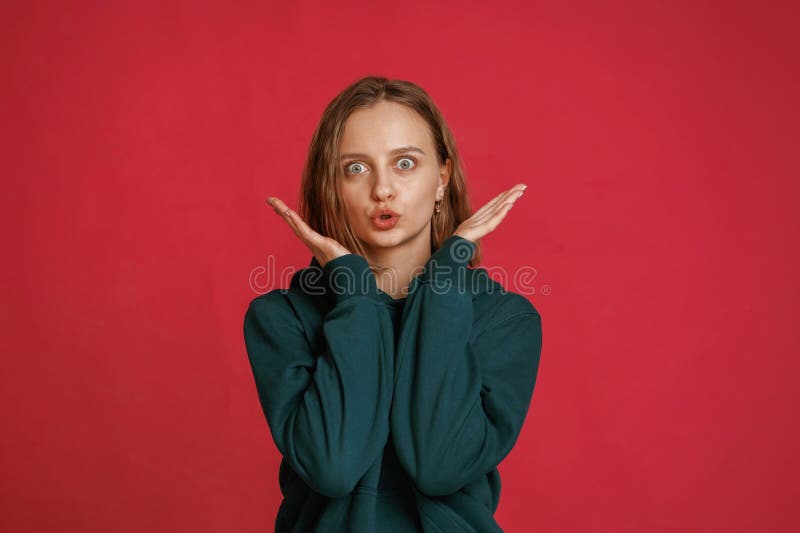 Making Funny Faces Young Woman Standing Against Red Background Studio ...