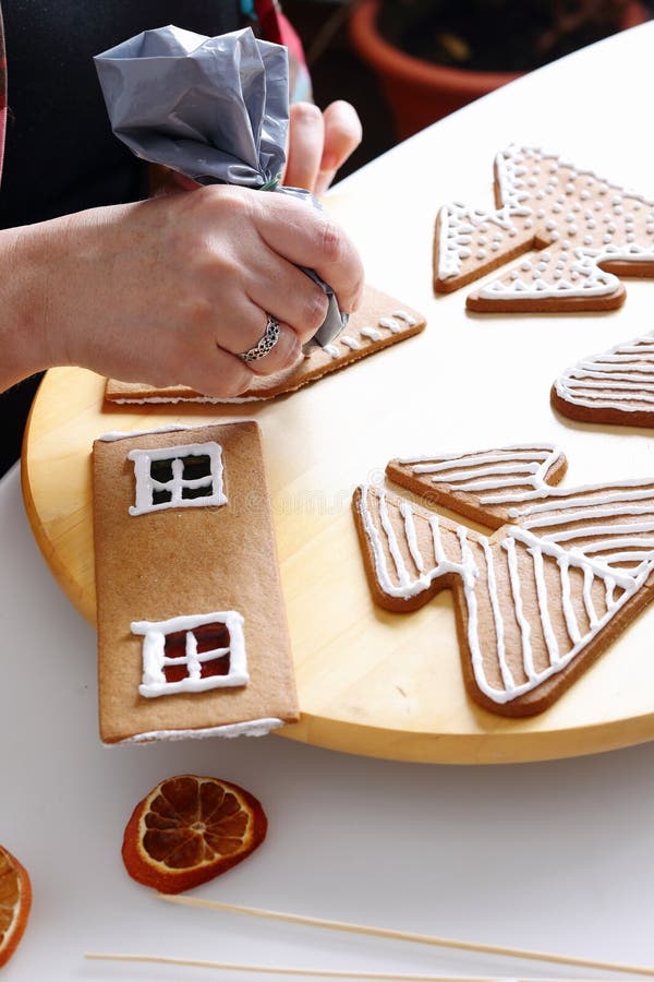 Making of Gingerbread House Stock Photo - Image of hand, christmas ...