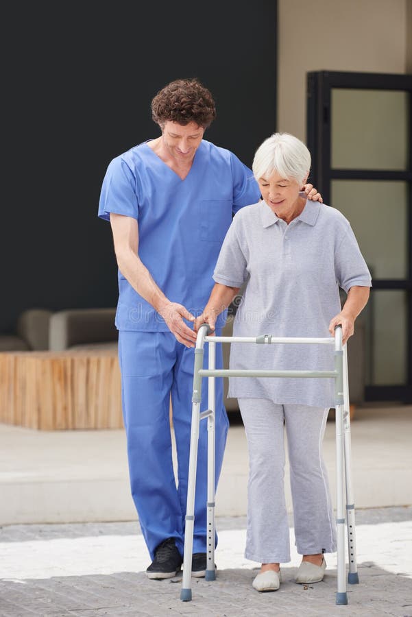 Making Great Progress with the Help of Her Doctor. a Male Doctor ...