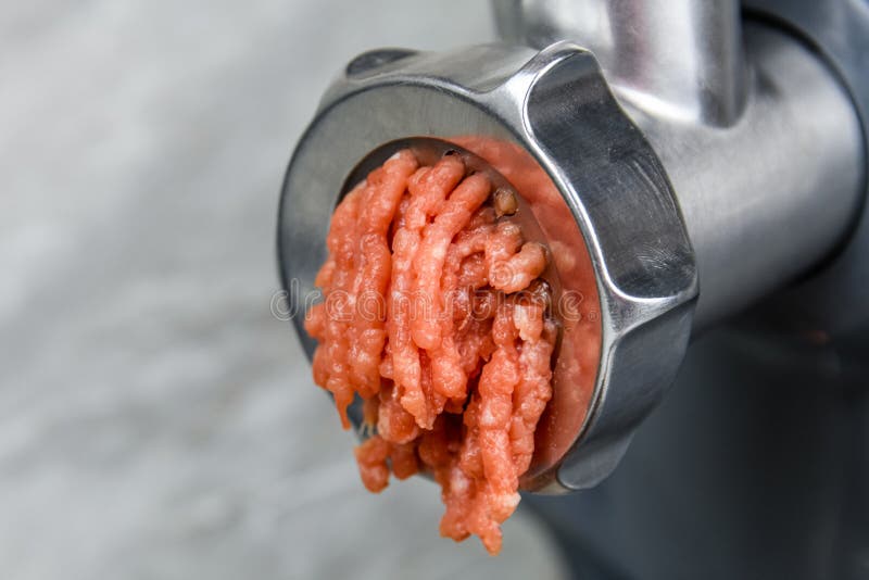 Making Ground Meat in Modern Food Processor with the Meat Grinder Stock ...