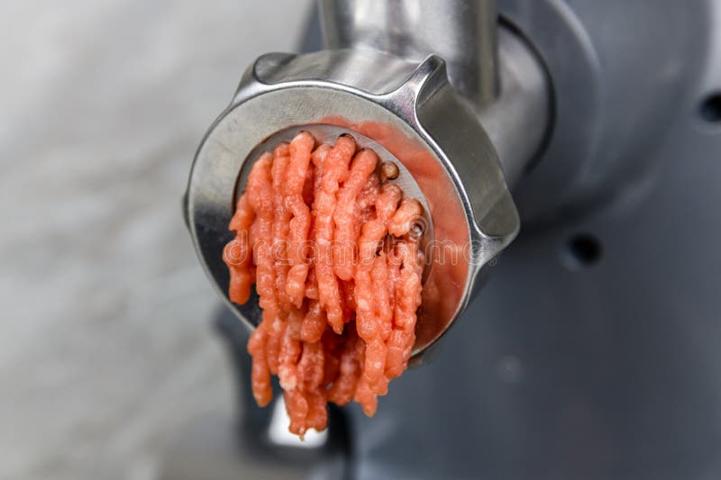 Making Ground Meat in Modern Food Processor with the Meat Grinder Stock ...