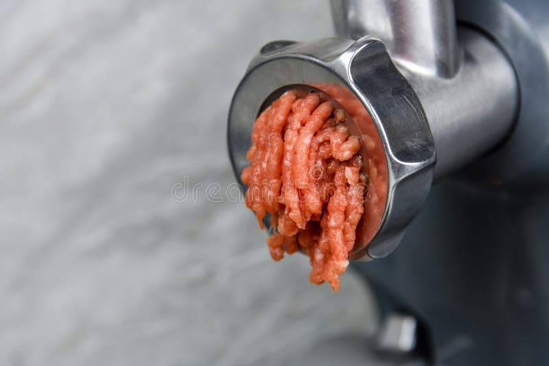 Making Ground Meat in Modern Food Processor with the Meat Grinder Stock ...