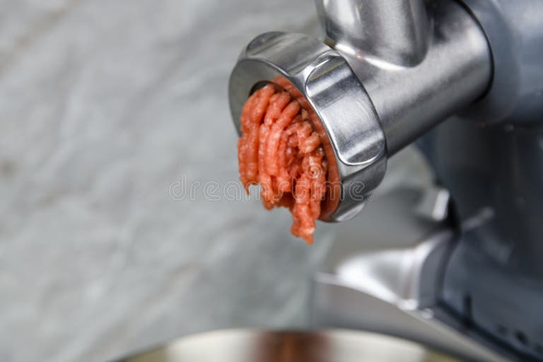 Making Ground Meat in Modern Food Processor with the Meat Grinder Stock ...
