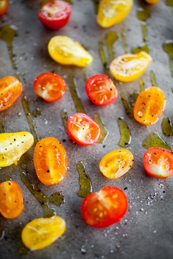 Making half dried tomatoes stock image. Image of delicious - 104847405