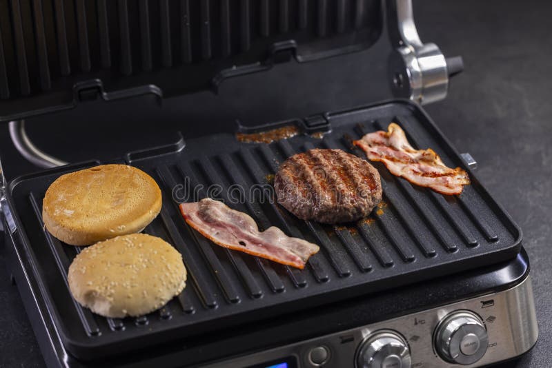 Making Hamburger on the Electric Grill Stock Image - Image of kitchen ...
