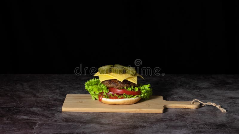Making a Hamburger, Side View of Assembling Ingredients. Stop Motion ...