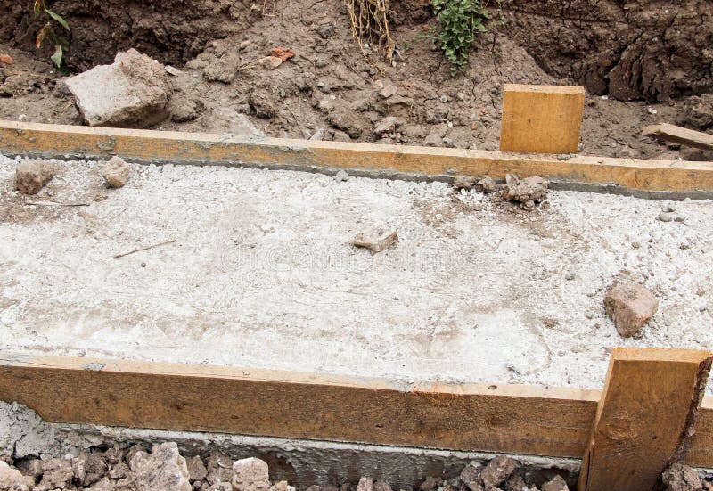 Making a High Reinforced Cement Concrete Curb. Wooden Forms and Steel ...