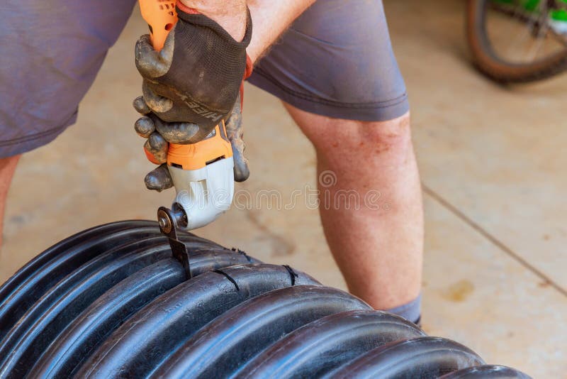 Making Hole in a Black Plastic Polypropylene Sanitary Pipe so that ...