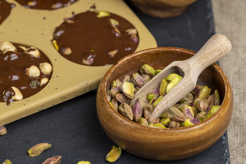 Making Homemade Chocolate with Cocoa Butter and Nuts Stock Photo ...