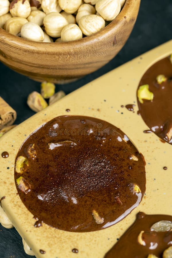Making Homemade Chocolate with Cocoa Butter and Nuts Stock Image ...