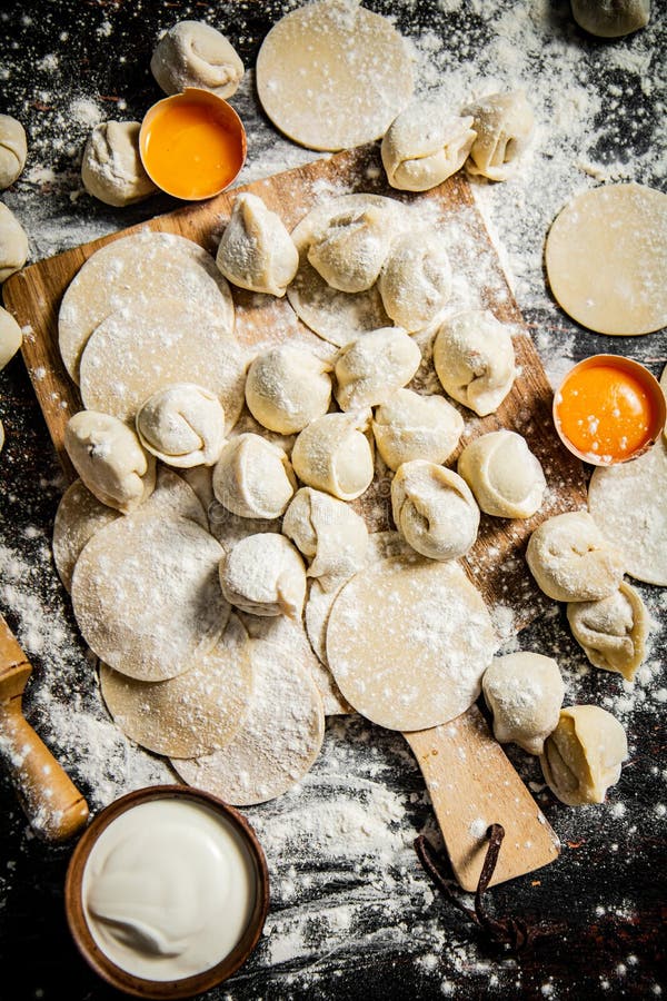 Making Homemade Dumplings on a Cutting Board. Stock Image - Image of ...