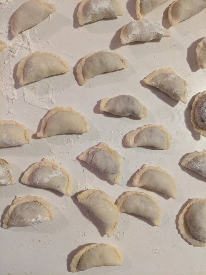 Making homemade pierogies stock image. Image of eating - 316056665