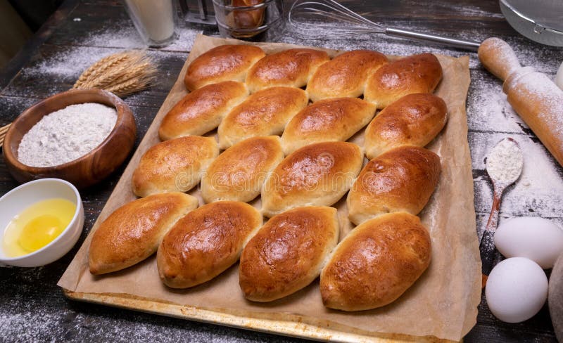Making Homemade Pies. Top View of Baking Sheet with Homemade Pies ...
