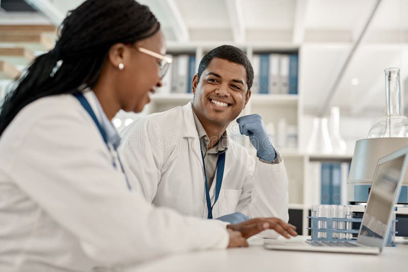 Making Impactful Discoveries Together. Two Scientists Working Together ...