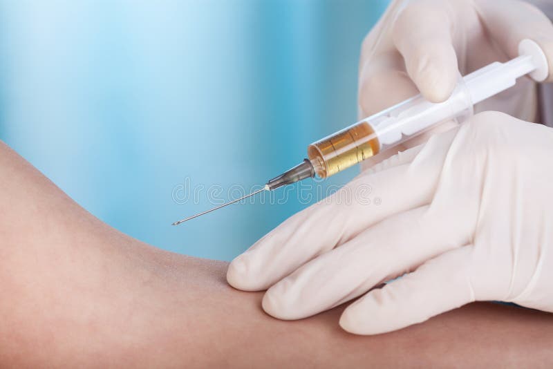 Making an injection stock image. Image of professional - 44261741