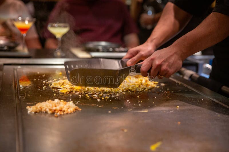 Making Japanese Fried Rice stock image. Image of garlic - 370599959