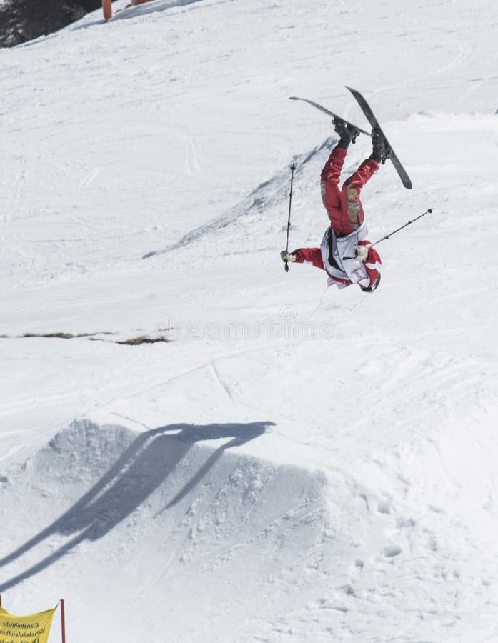 Making a jump while skiing stock image. Image of jumping - 312215597