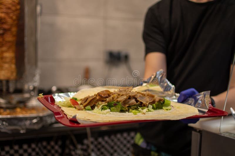 Making a Kebab in a Restaurant Chicken Salad in Rollo Stock Image ...