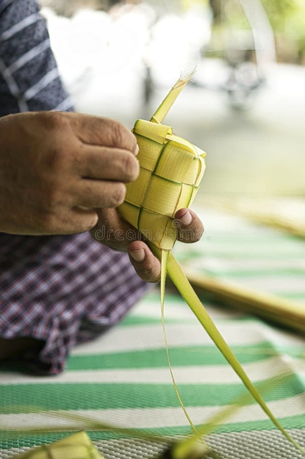 Making the ketupat stock photo. Image of boil, decoration - 247308064
