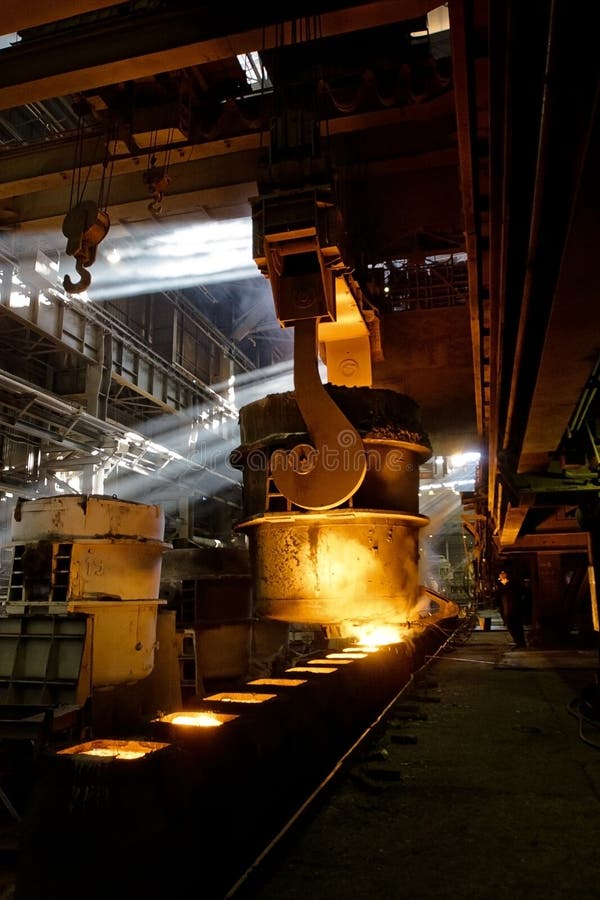 Making metal in factory stock image. Image of molten - 63343031
