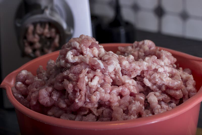 Making Minced Meat Using a Meat Grinder. Minced Meat in a Colored Bowl ...