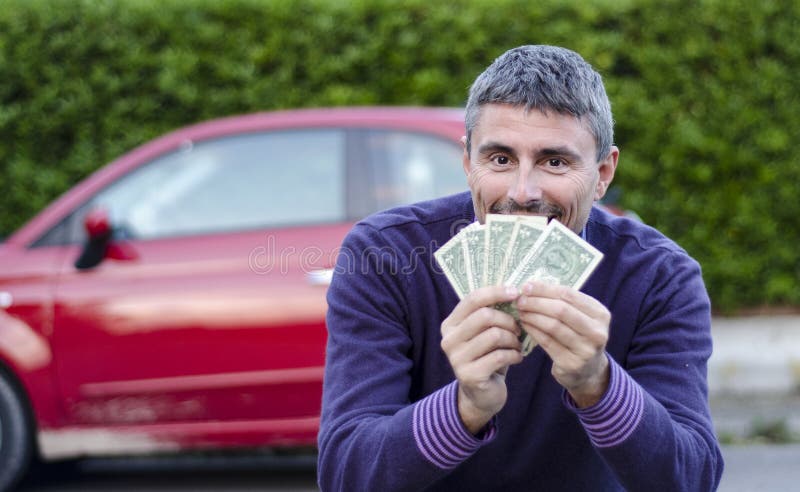 Making Money Selling Cars stock photo. Image of holding - 24453494