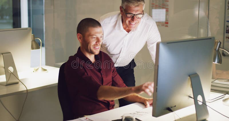 Making the Most of the Expertise Available. Two Businessmen Working ...