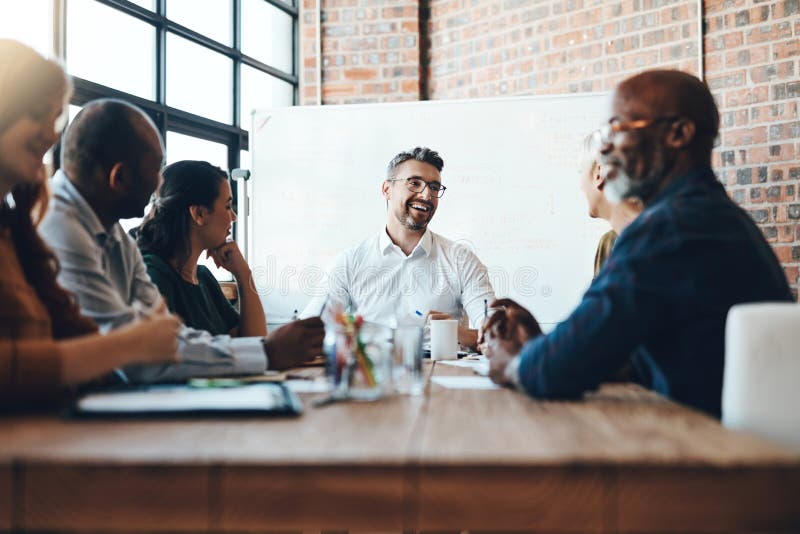 Making the Most Out of Collaboration. a Businessman Leading a Meeting ... Making the Most Out of Collaboration. a Businessman Leading a Meeting ...
