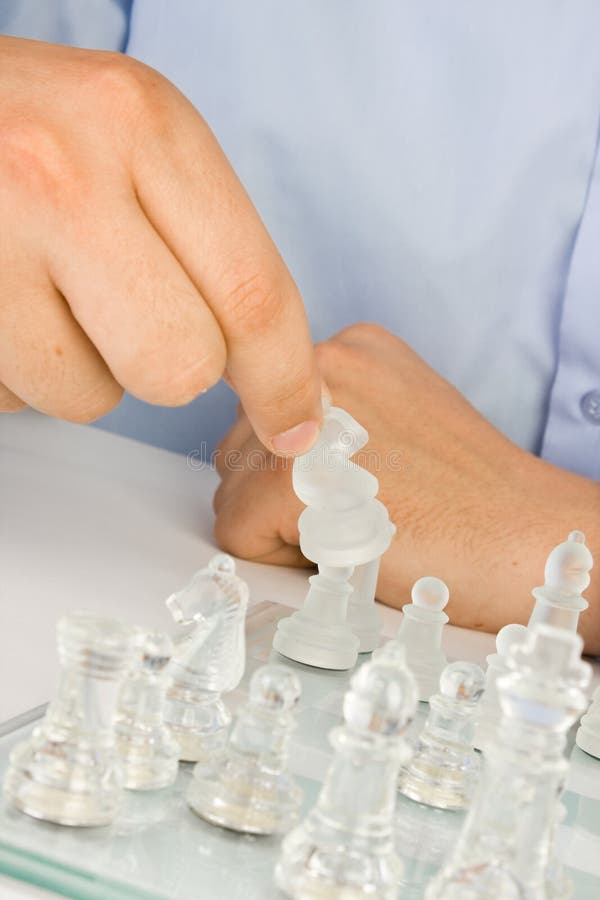 Making Move on Glass Chessboard Stock Photo - Image of glass, finger ...