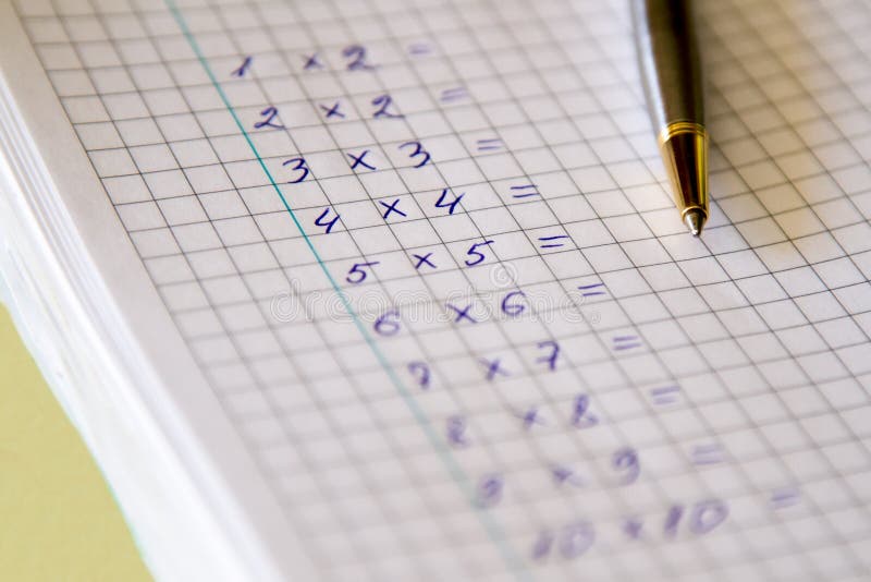 Making a Multiplication with a Pen Stock Photo - Image of start ...