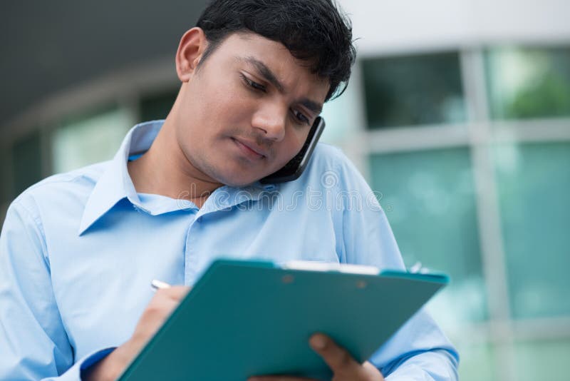 Making notes stock image. Image of asian, adult, focus - 32821803