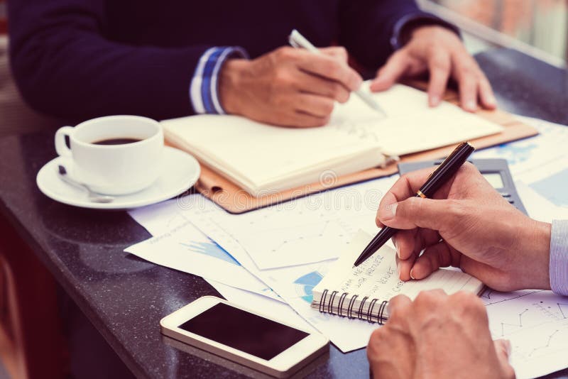 Making notes stock photo. Image of office, colleagues - 32672396