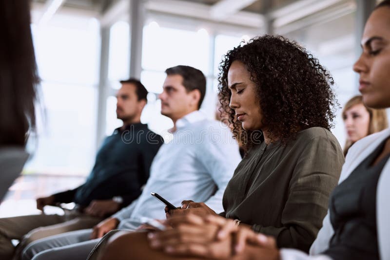 Making Notes for Follow Up. a Businesswoman Using Her Mobile Phone ...