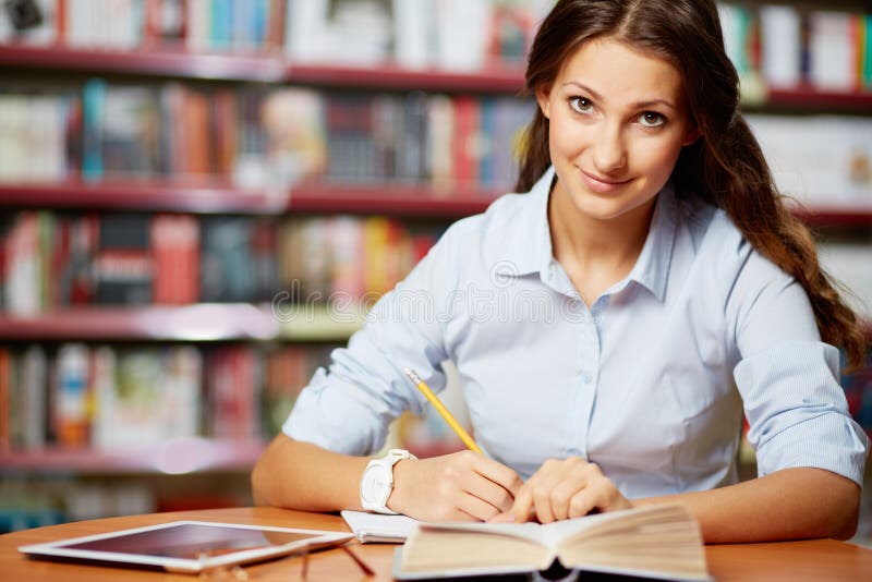 Making notes in library stock image. Image of girl, person - 34412851